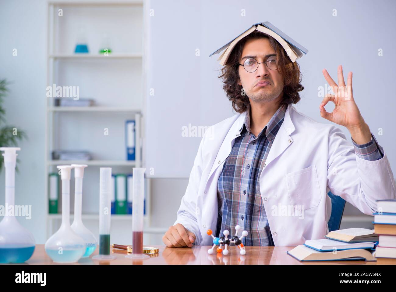 The chemistry lecturer during lecture in college Stock Photo - Alamy