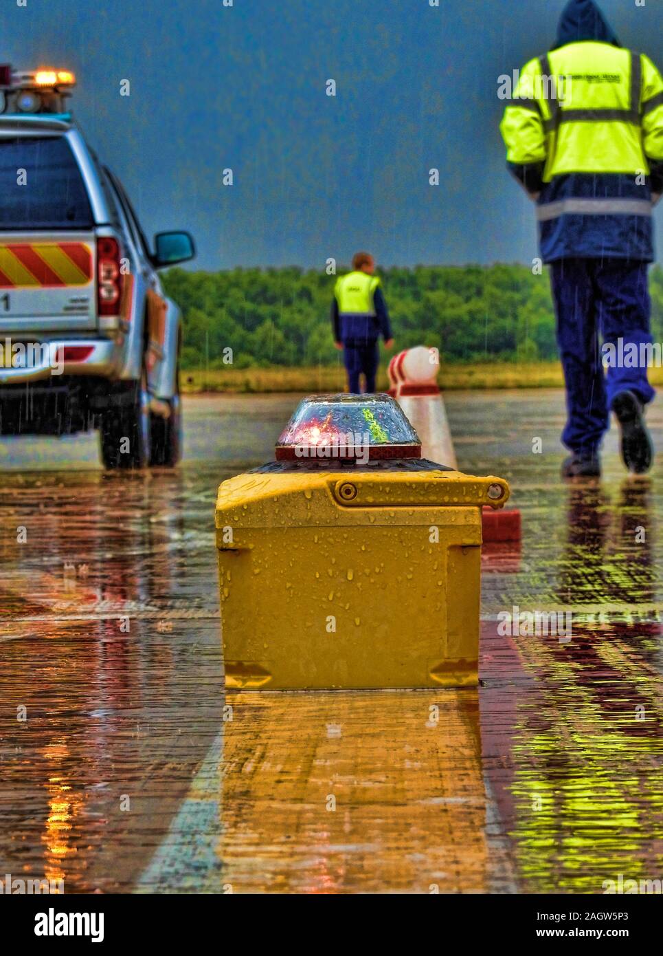 Airport Operations at work at one of the UK's largest airports Stock ...