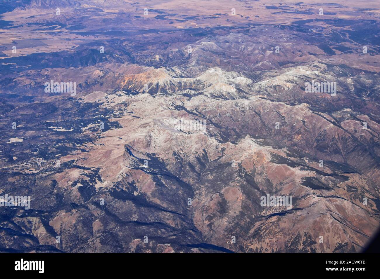 Colorado Rocky Mountains Aerial view from airplane of abstract ...
