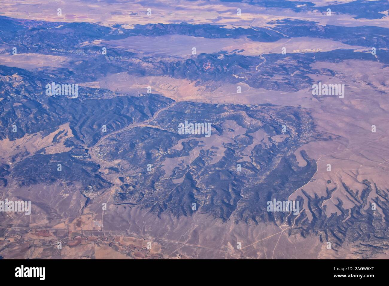 Colorado Rocky Mountains Aerial view from airplane of abstract ...