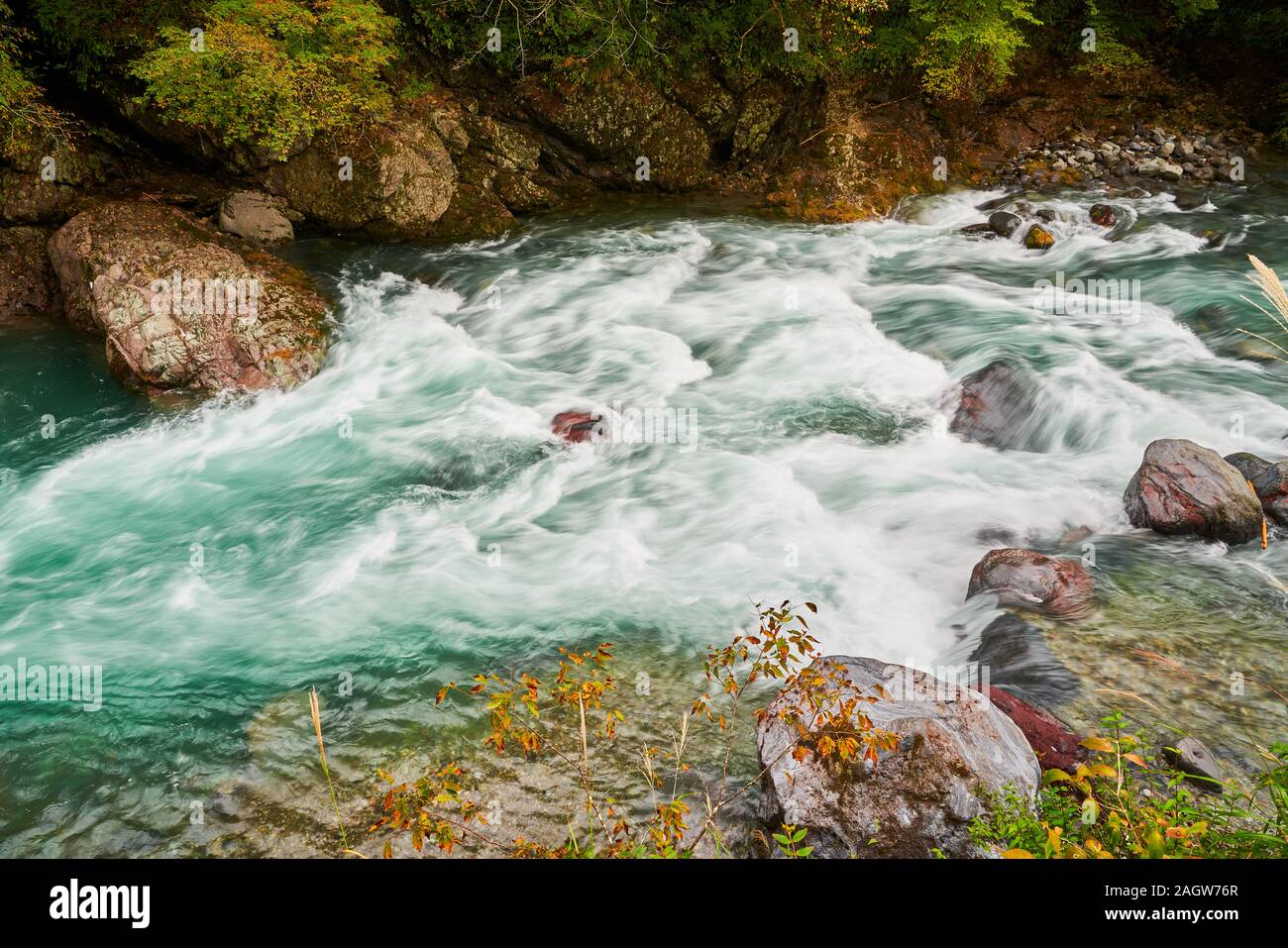 scenic of nikko water flow smooth in stream pond autumn japan season ...