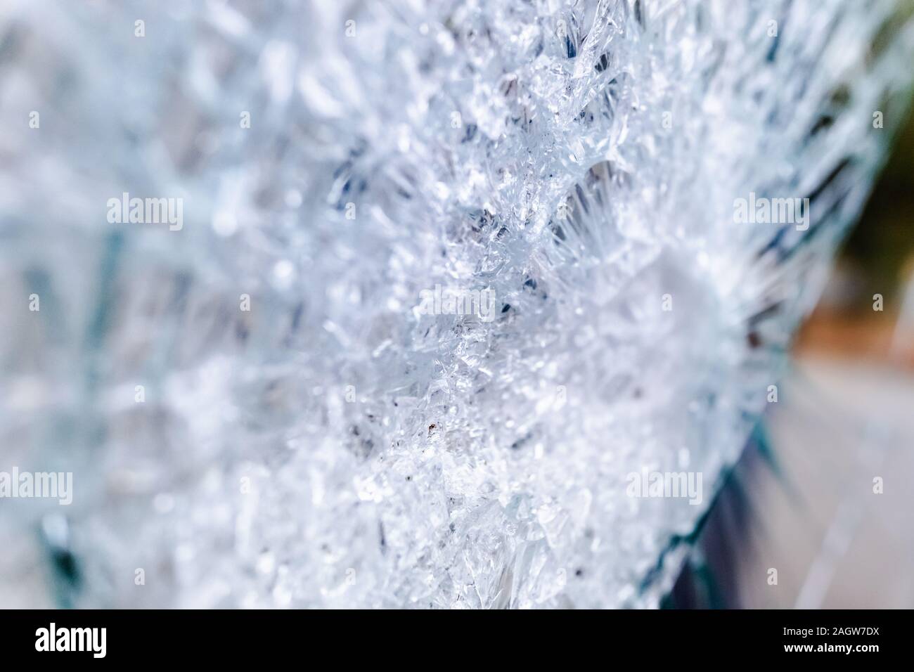 Glass of a broken and cracked commercial showcase Stock Photo - Alamy