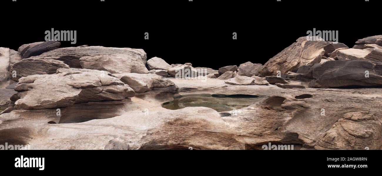 rock isolated on black background Stock Photo - Alamy