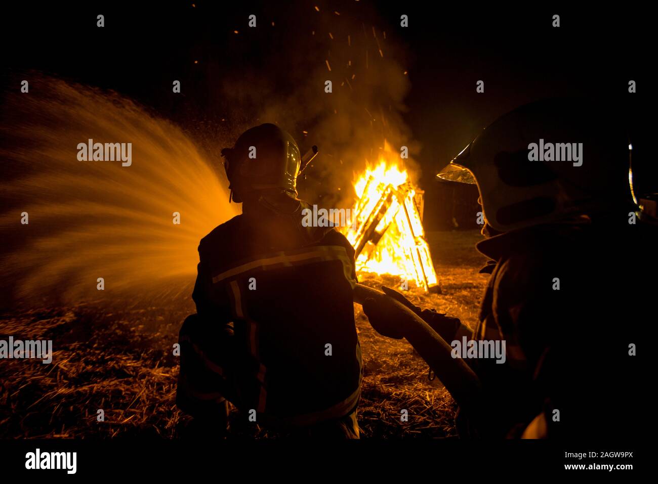 Fire department in the field during a fire emergency situation Stock ...