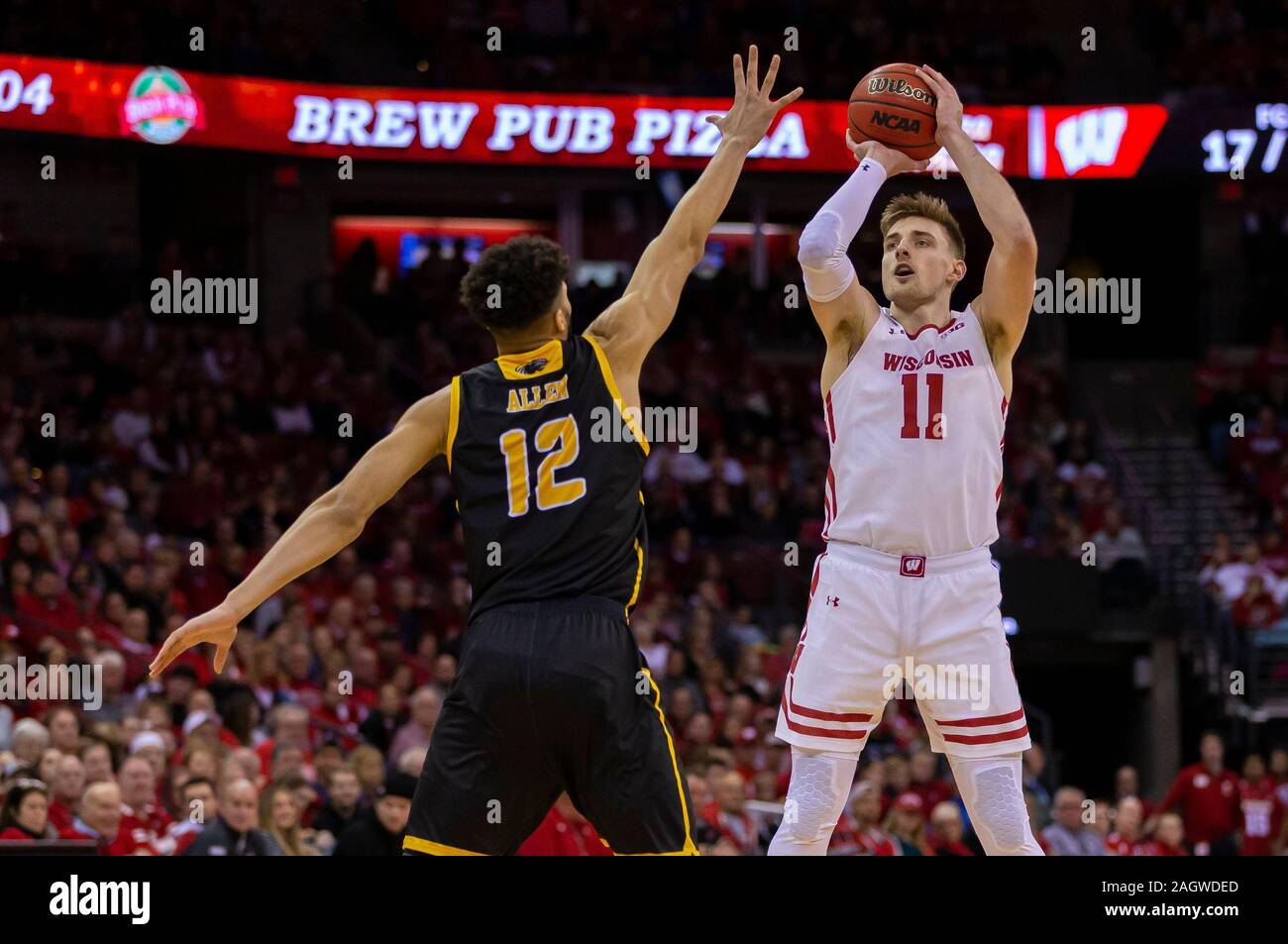 Madison, WI, USA. 21st Dec, 2019. Wisconsin Badgers forward Micah ...
