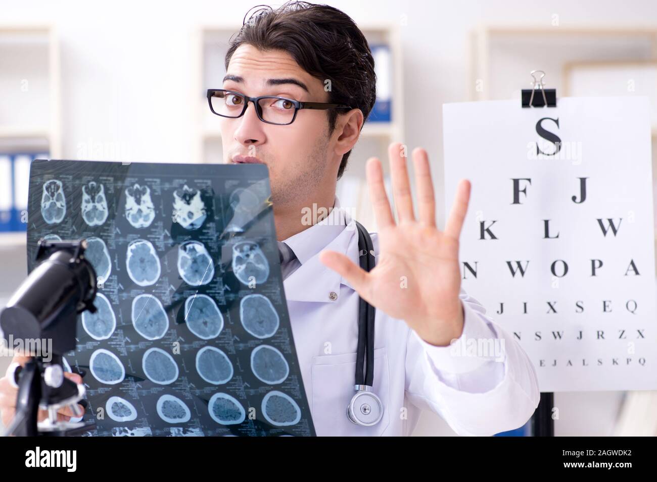 The eye doctor in medical concept Stock Photo - Alamy