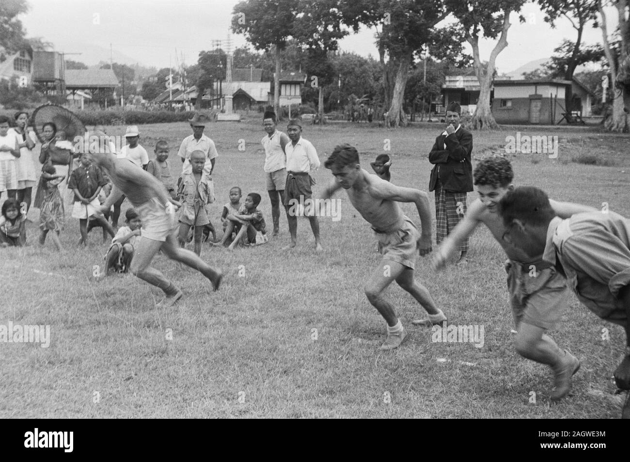 Men running a race in Indonesia ca. 1947 Stock Photo - Alamy