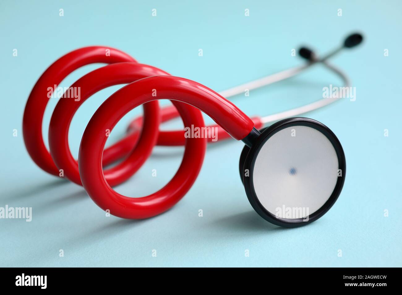 Red doctor stethoscope on blue modern background Stock Photo - Alamy