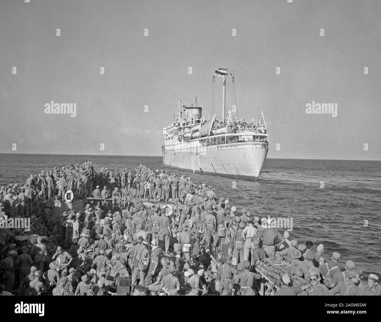 LCT is approaching the Boissevain Bali, Indonesia, Dutch East Indies ca ...