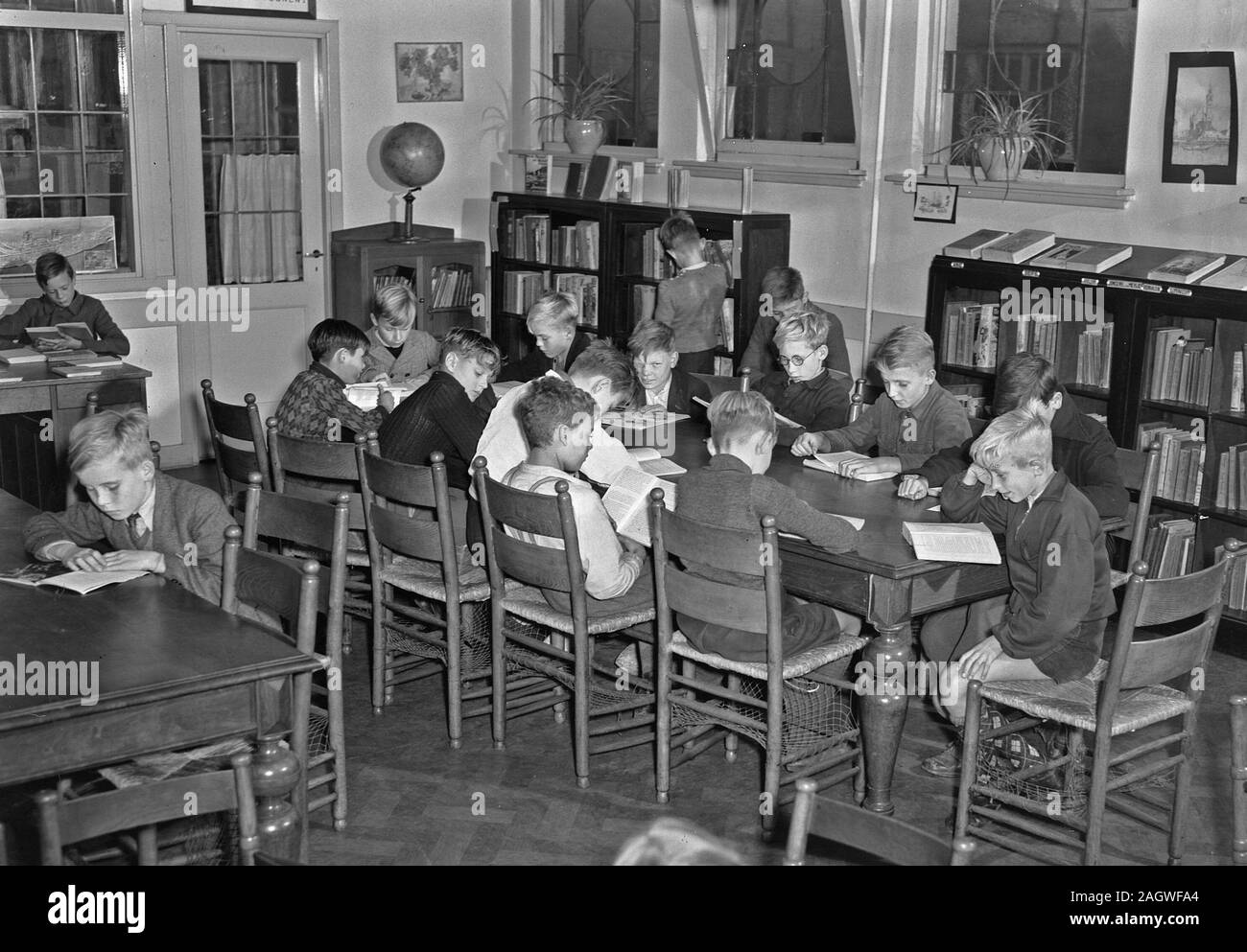 1940s Libraries - Young boys in the children's reading room Wijdesteeg ...