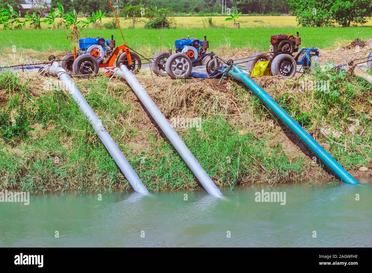 Row of water pump on trailer used to pump water from irrigation canal ...