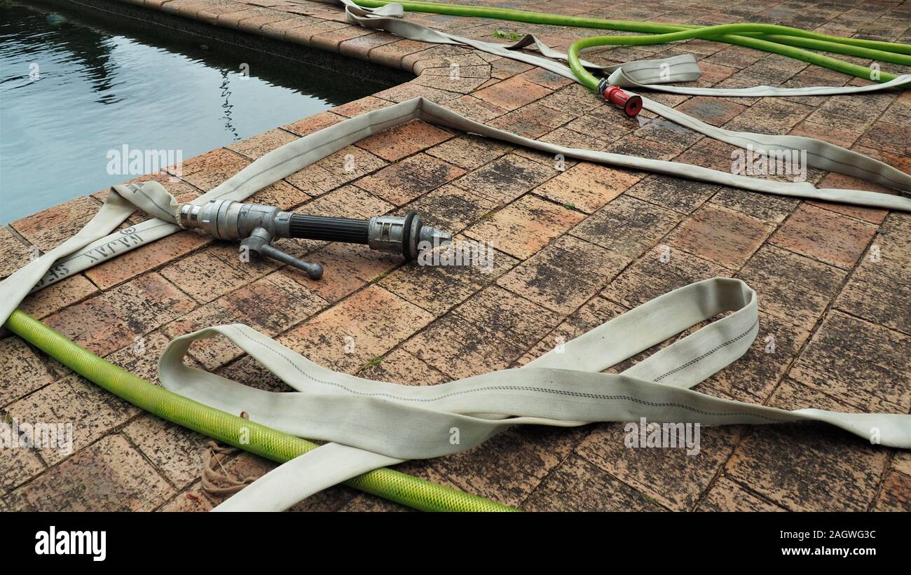 Using a swimming pool for fire fighting hi-res stock photography and ...