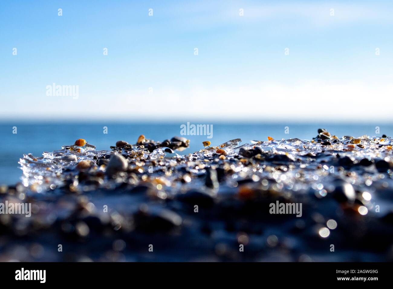 Beautiful ice shapes from objects in the beach Stock Photo - Alamy