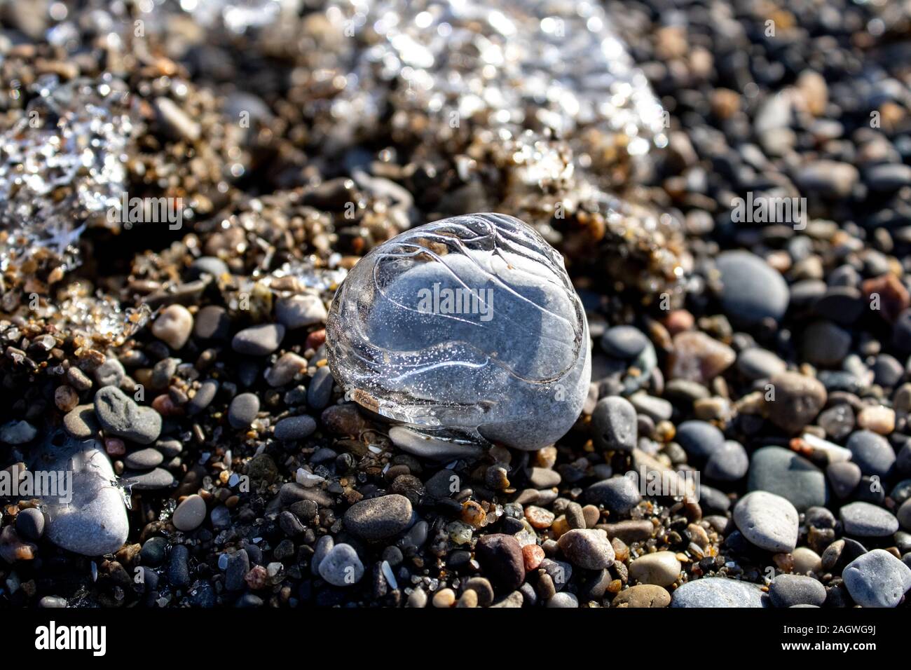 Beautiful ice shapes from objects in the beach Stock Photo - Alamy