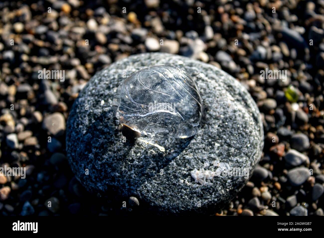 Beautiful ice shapes from objects in the beach Stock Photo - Alamy