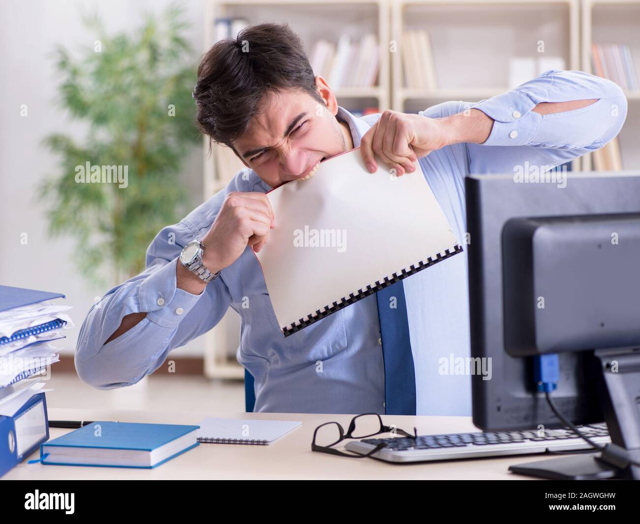 The tired businessman with too much paperwork Stock Photo - Alamy