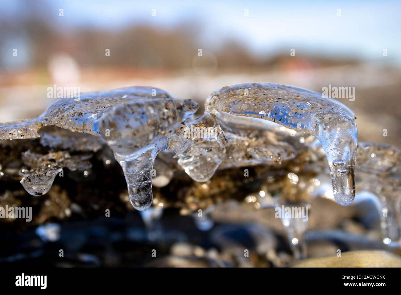 Beautiful ice shapes from objects in the beach Stock Photo - Alamy
