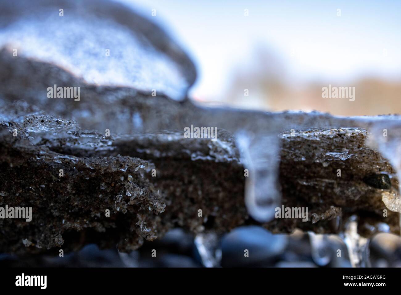 Beautiful ice shapes from objects in the beach Stock Photo - Alamy