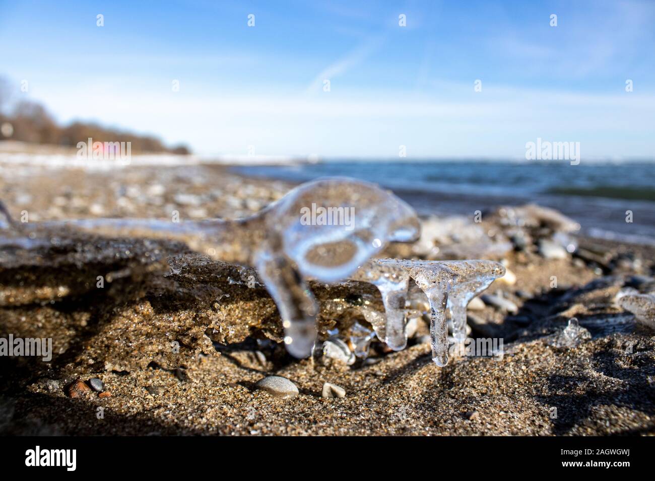 Beautiful ice shapes from objects in the beach Stock Photo - Alamy