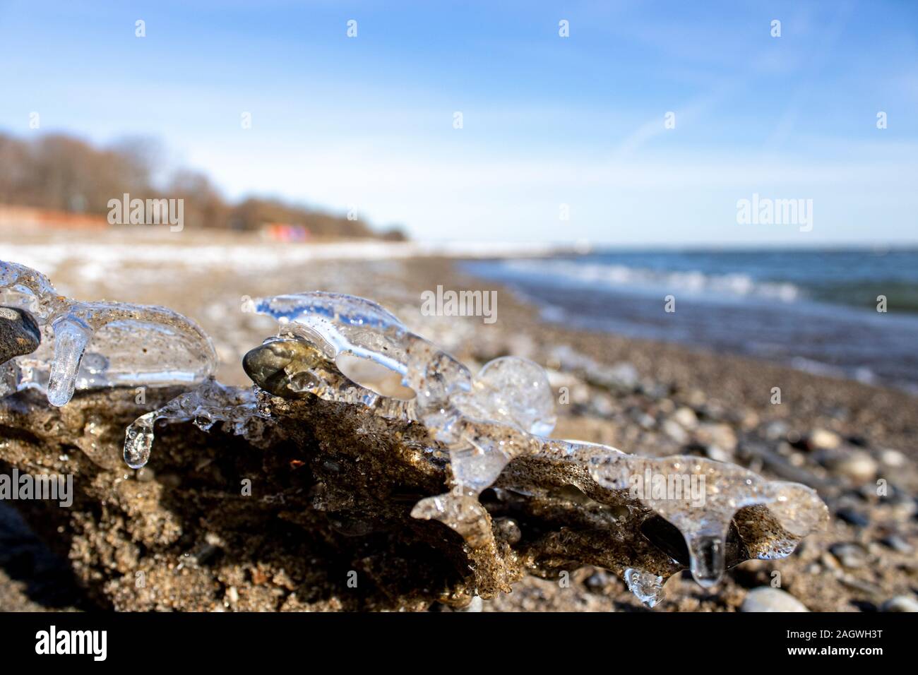 Beautiful ice shapes from objects in the beach Stock Photo - Alamy