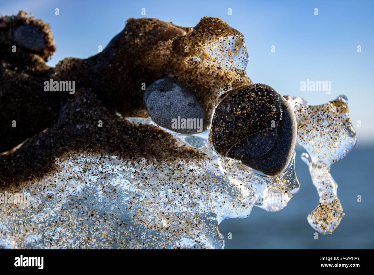Beautiful ice shapes from objects in the beach Stock Photo - Alamy