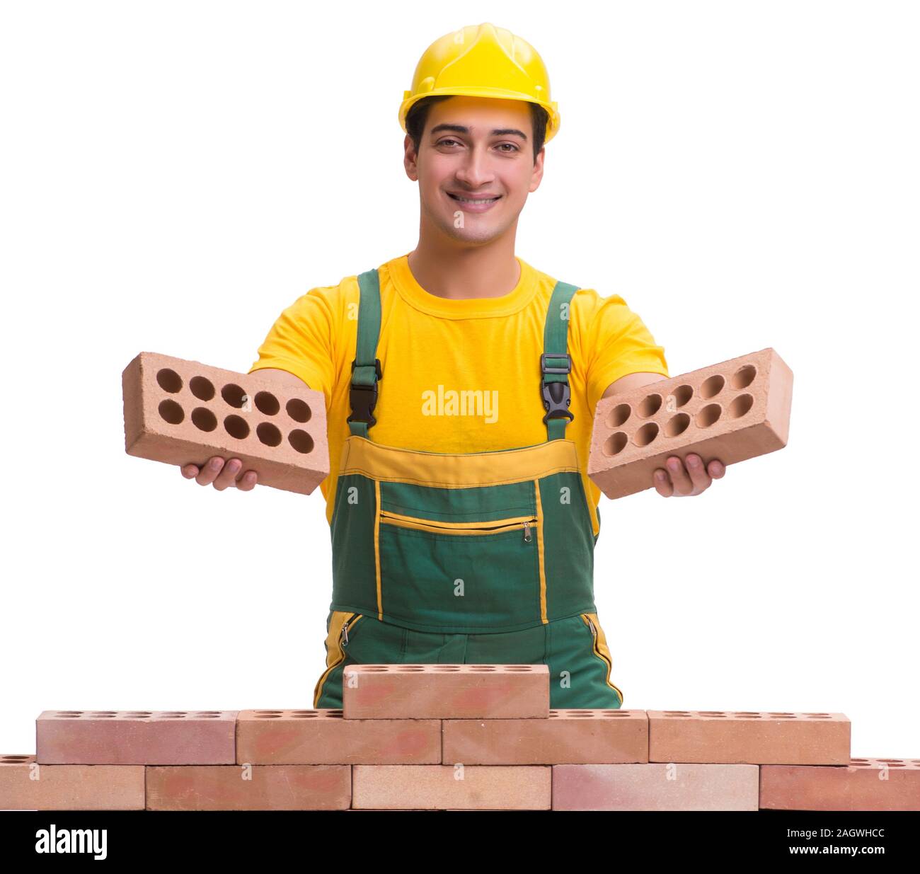 The the handsome construction worker building brick wall Stock Photo ...