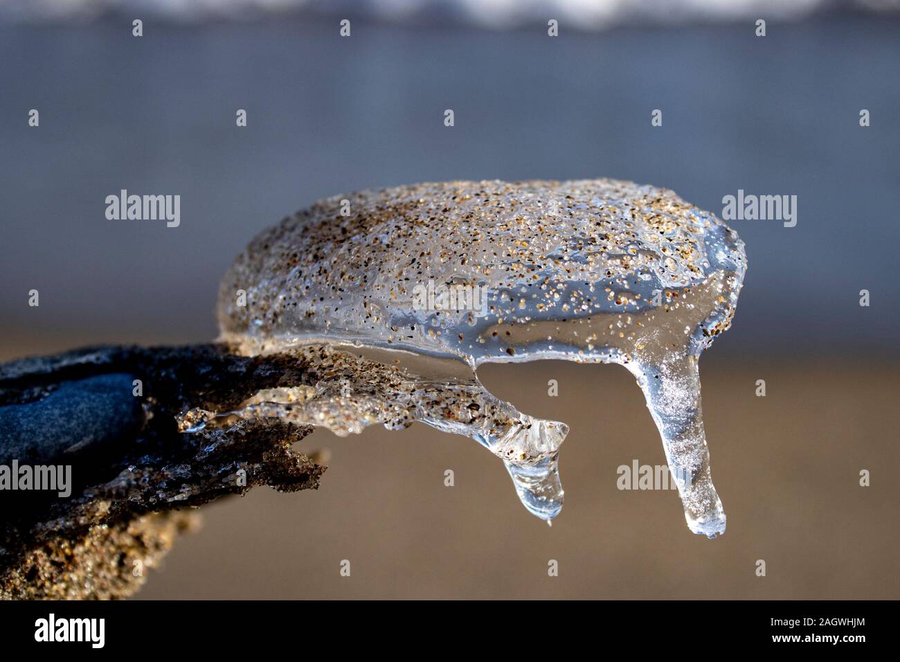 Beautiful ice shapes from objects in the beach Stock Photo - Alamy