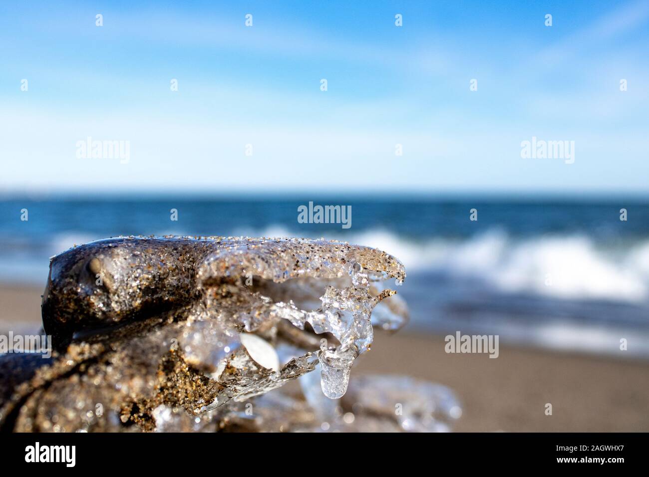 Beautiful ice shapes from objects in the beach Stock Photo - Alamy