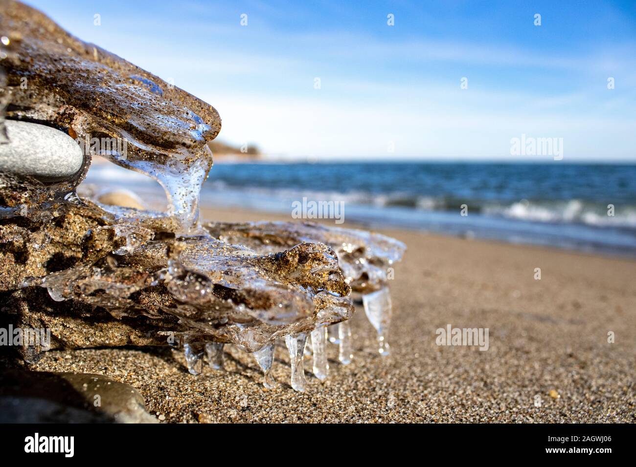 Beautiful ice shapes from objects in the beach Stock Photo - Alamy