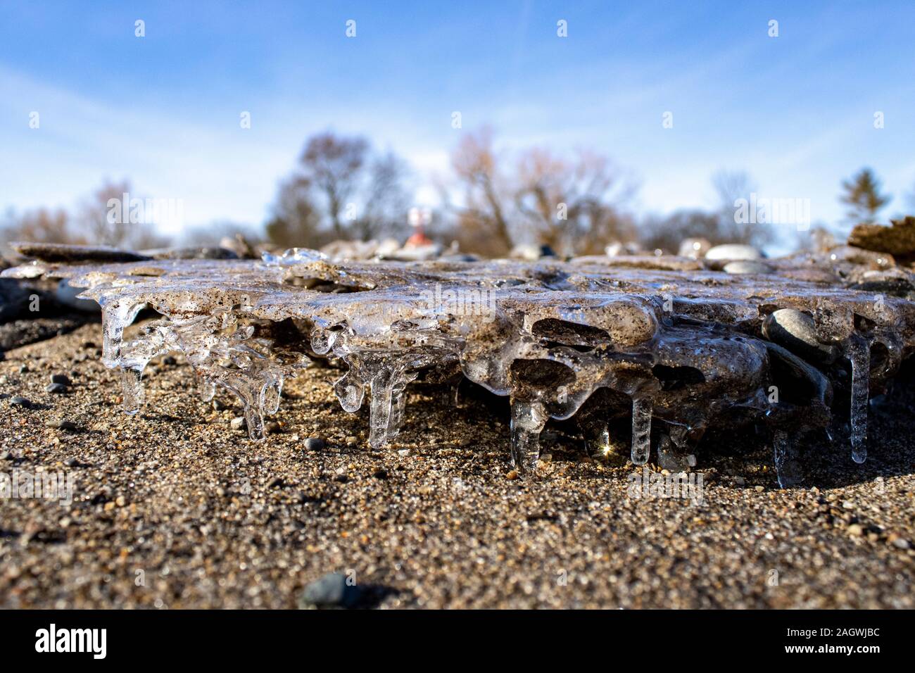 Beautiful ice shapes from objects in the beach Stock Photo - Alamy