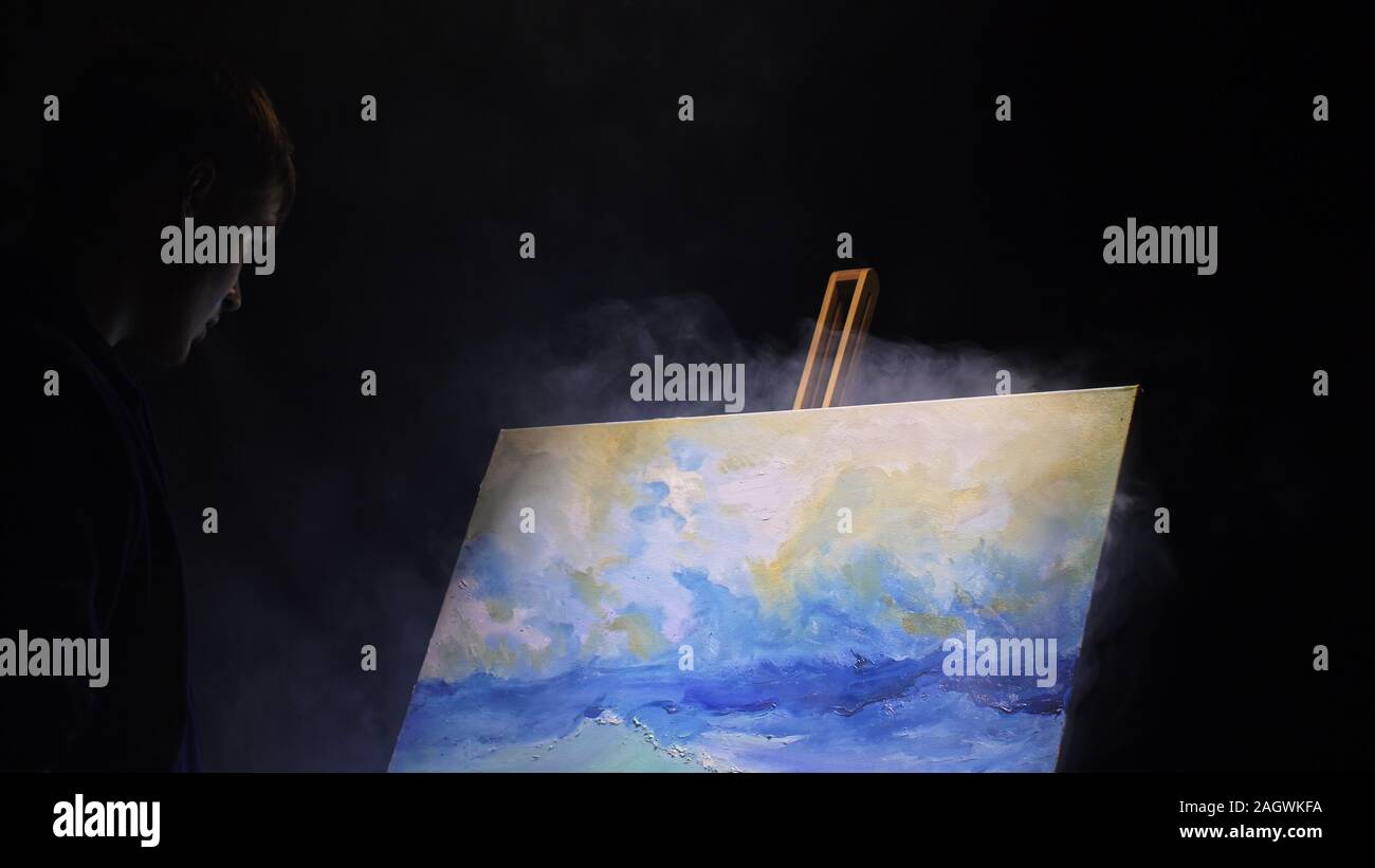 Artist copyist paint seascape with ship in ocean. Vaper smoke vape e ...
