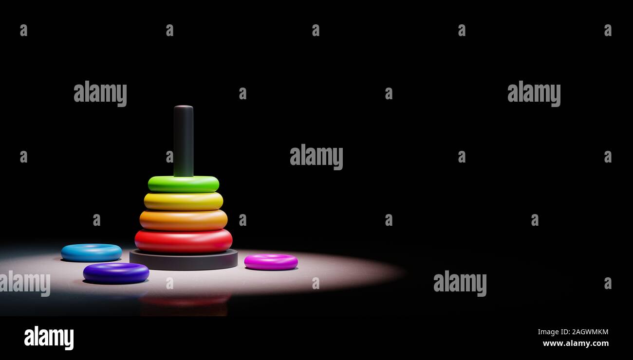Stack of Colorful Plastic Disks in Ascending Order Spotlighted on Black ...