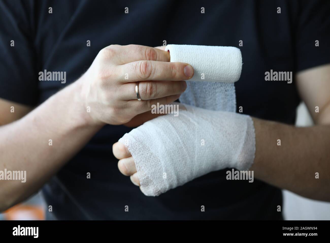 Male hand with tight elastic bandage on arm closeup Stock Photo - Alamy