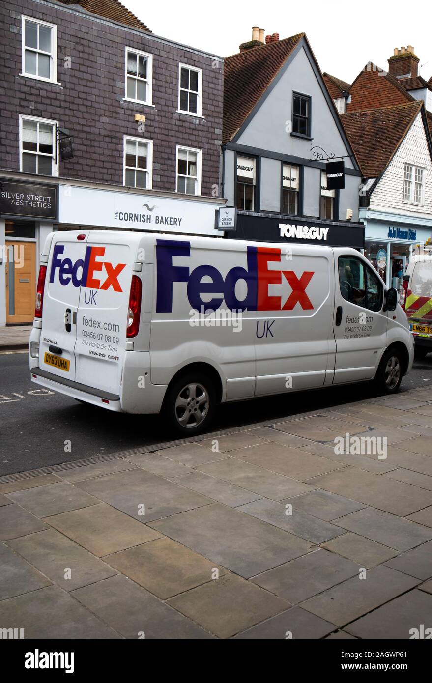 FedEx UK van parked in town centre making parcel delivery, formally ...