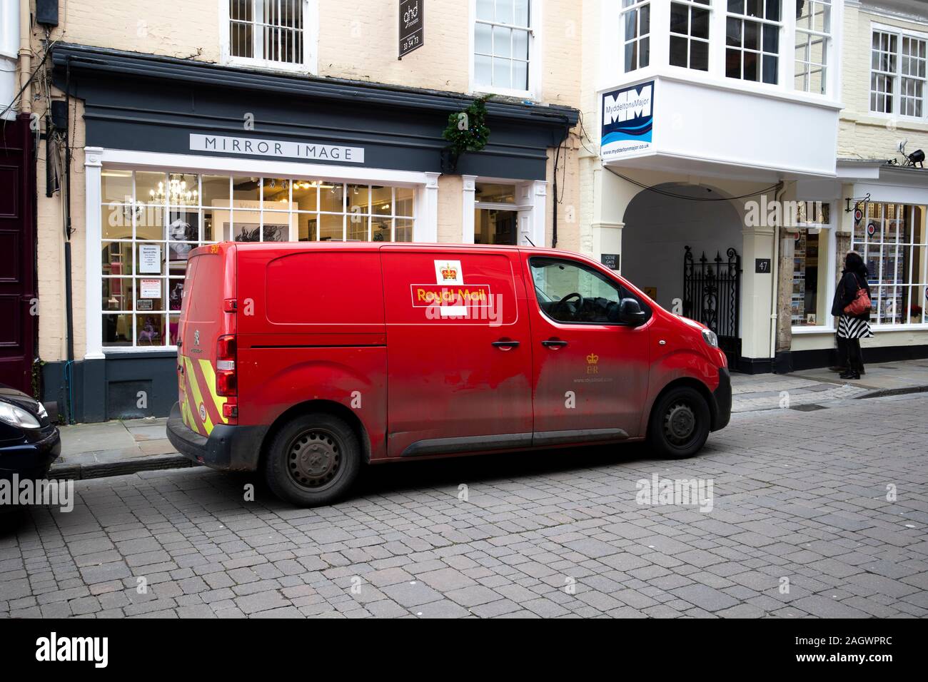 Royal Mail van parked in town centre making parcel delivery, company ...