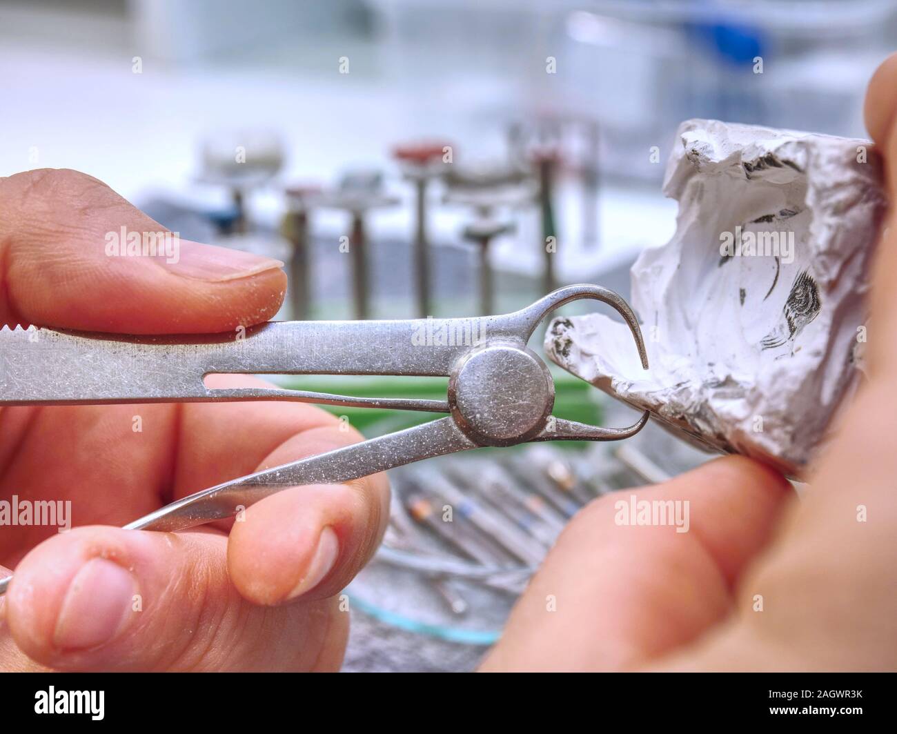 Dental prosthetics work with tools and ceramic crown denture ...