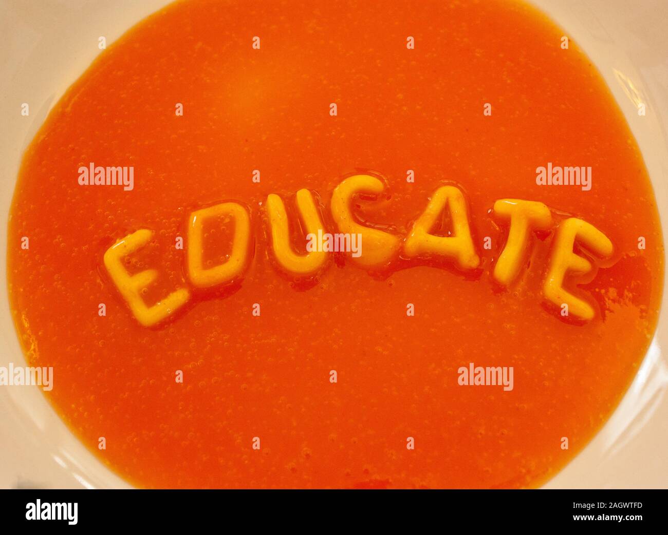 Spaghetti letters in a bowl spelling out the word 'Educate' Stock Photo ...