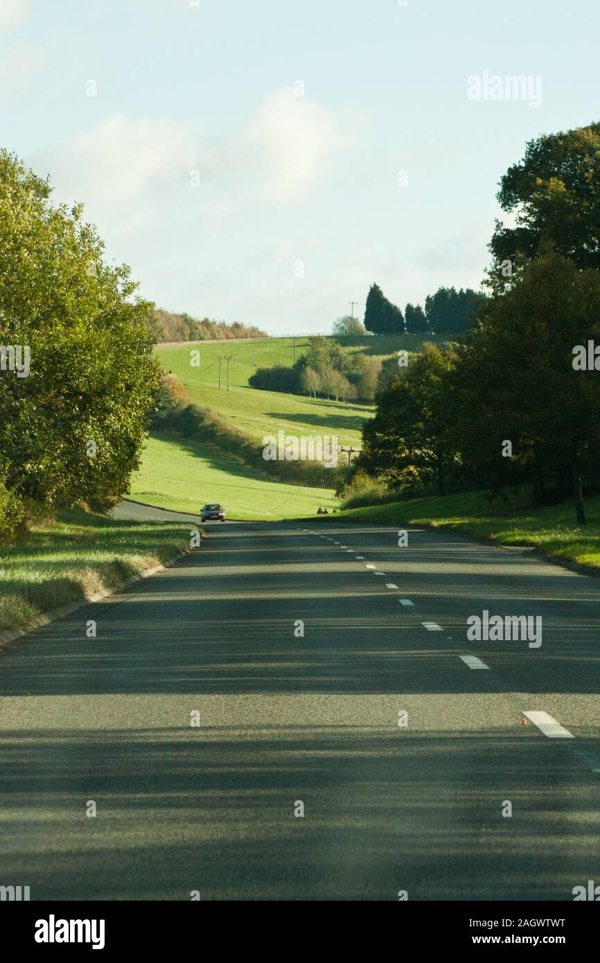 A road weaving it's way through the countryside, in the United Kingdom ...
