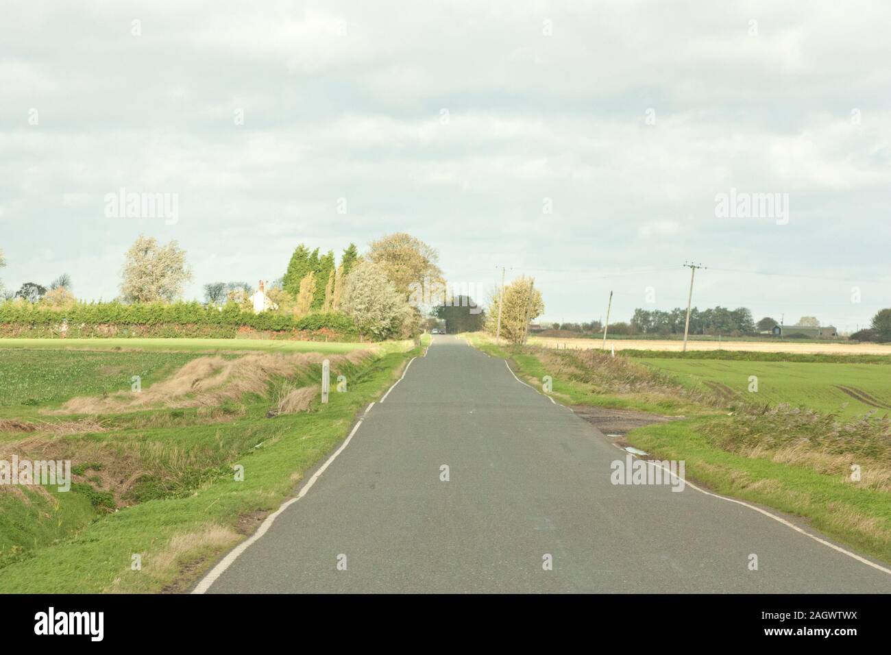 A road weaving it's way through the countryside, in the United Kingdom ...