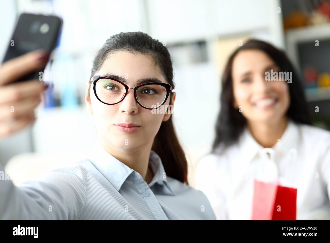 Cute woman on meeting Stock Photo - Alamy