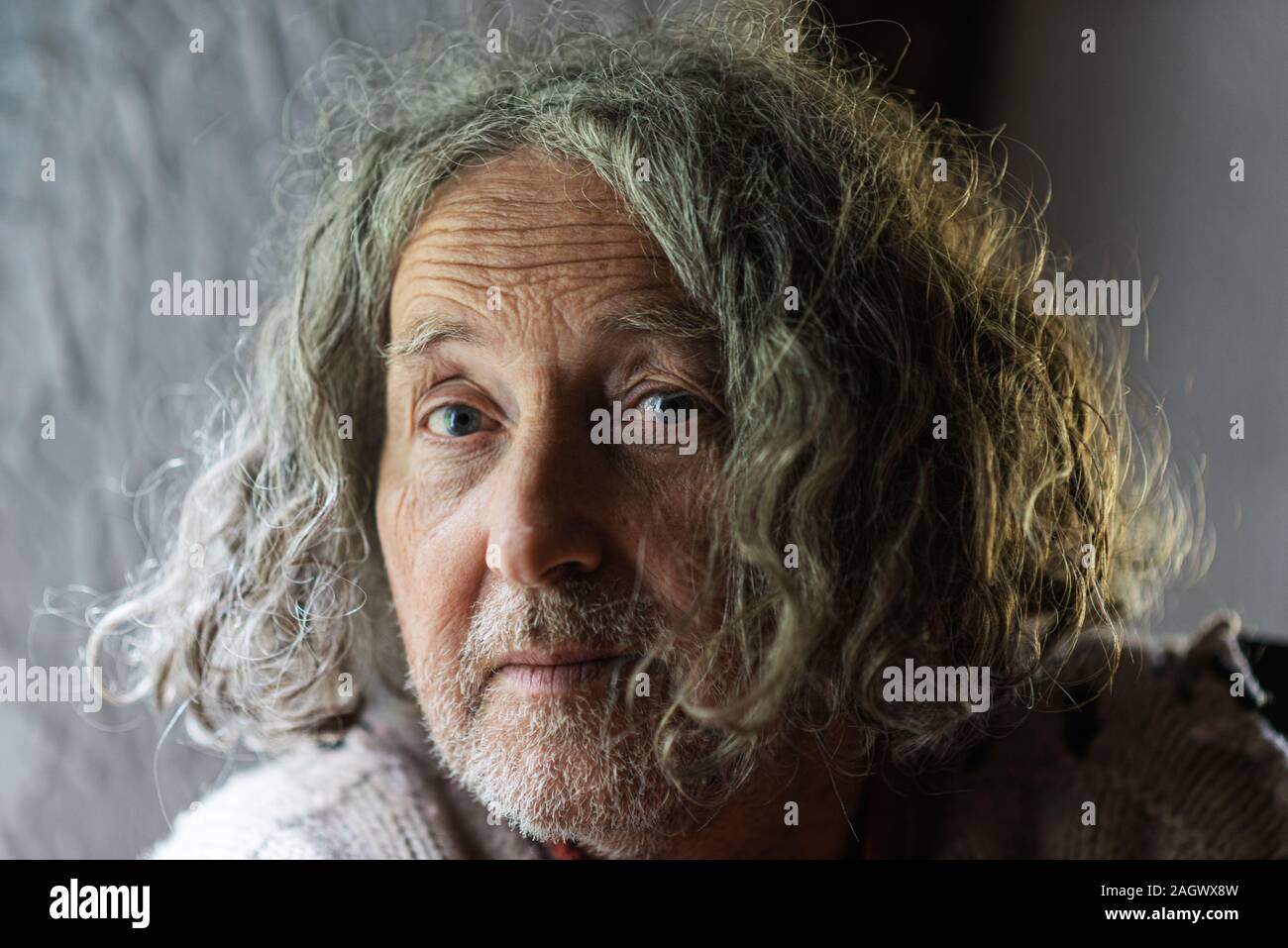Mature male curly hair hi-res stock photography and images - Alamy