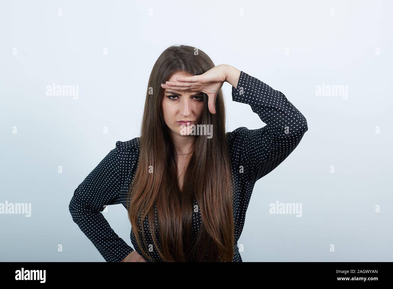 Hand On Forehead Looking