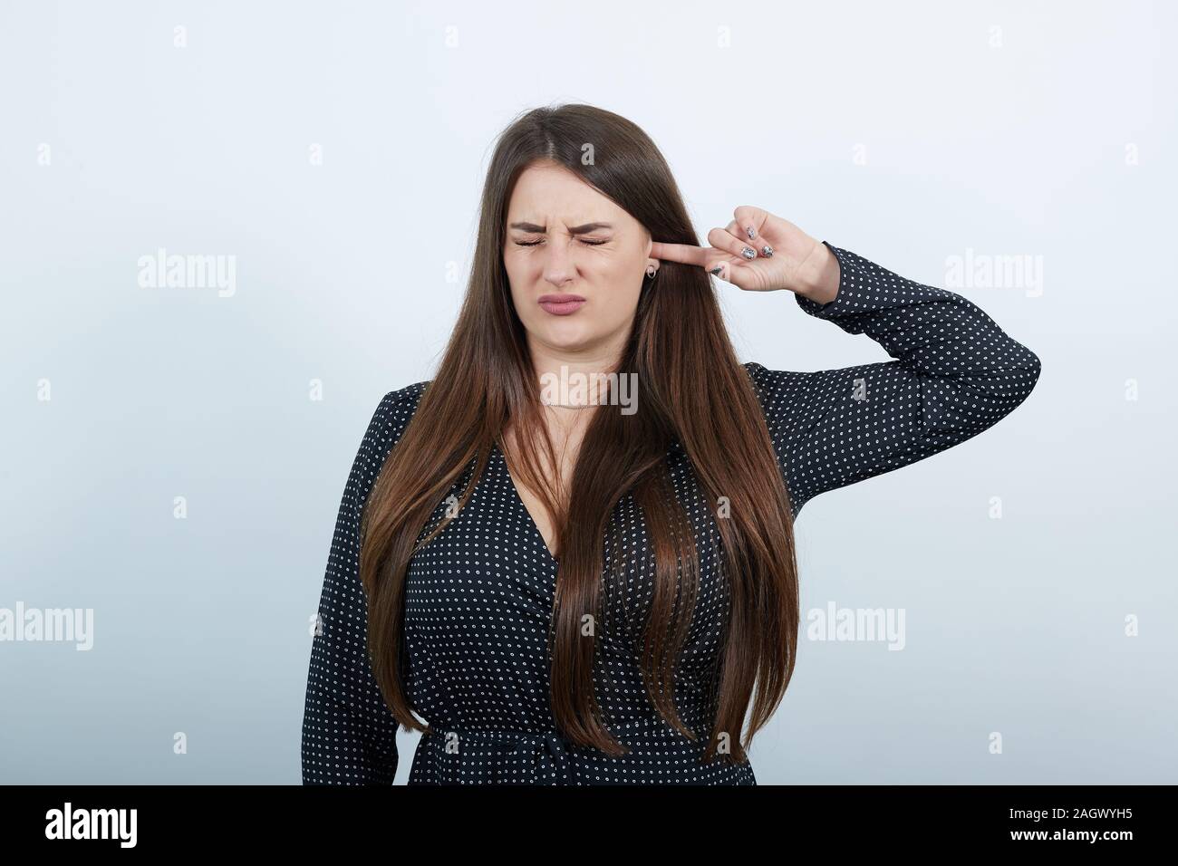 Squeezing face hi-res stock photography and images - Alamy