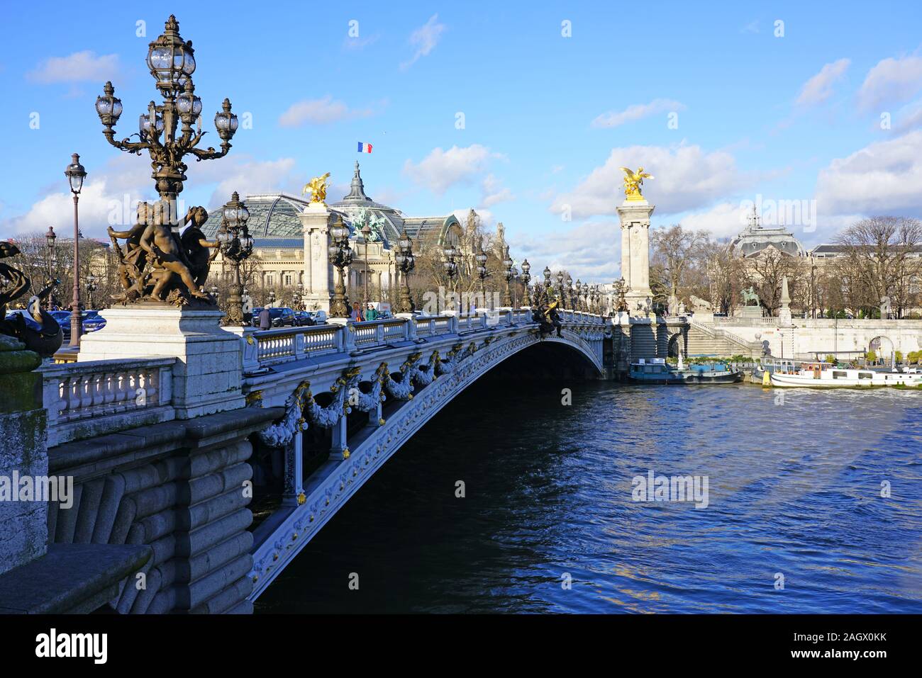 PARIS, FRANCE -20 DEC 2019- Ornate black and gold statues on the Pont ...
