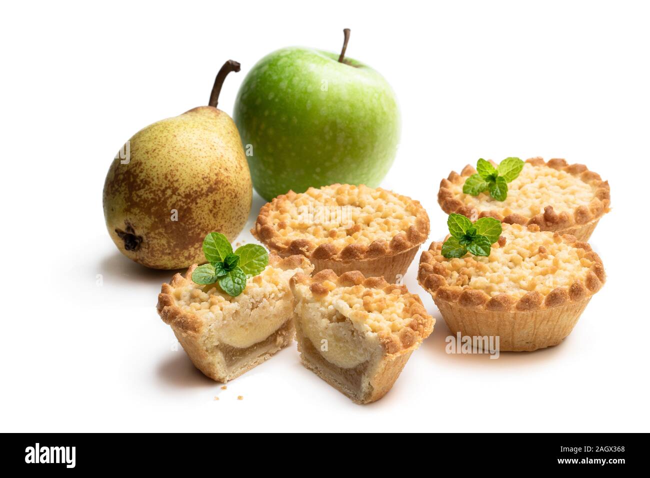 Mini apple and pear custard crumble tarts isolated on white Stock Photo ...
