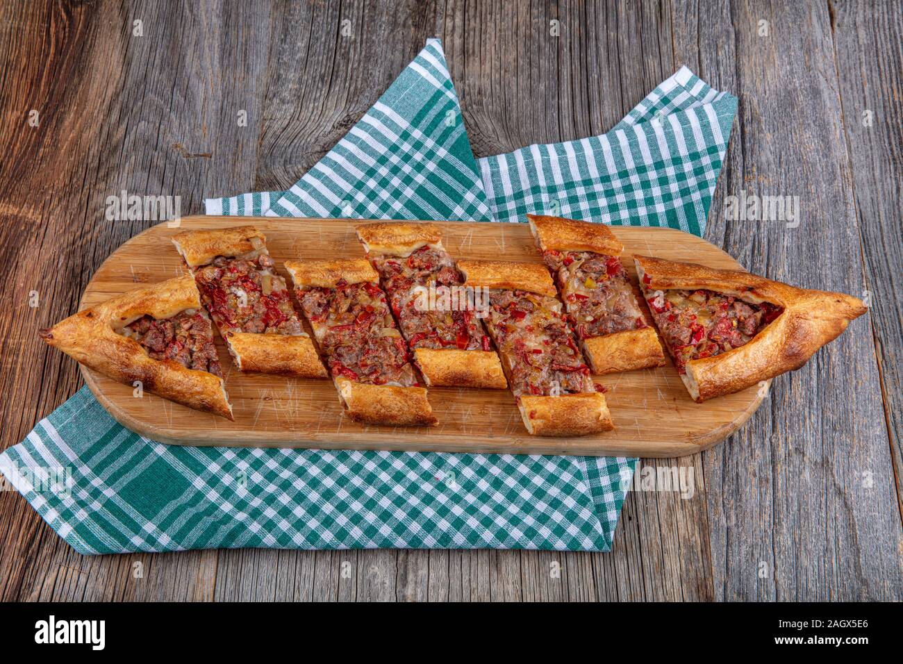 Traditional Turkish dish pita beef - Kusbasili Pide. Turkish Pide with ...