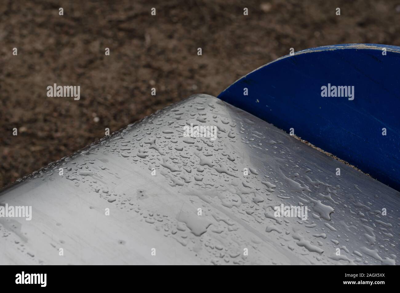 Raindrops on an empty slide for children. Fragment of an empty slide ...