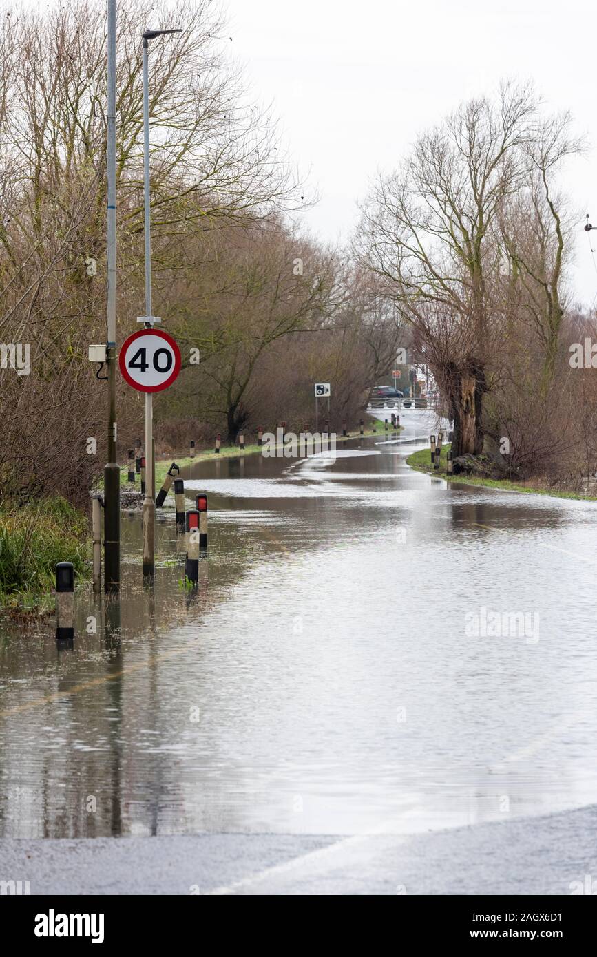 Earith, UK. 22nd Dec, 2019. The River Great Ouse floods roads and ...