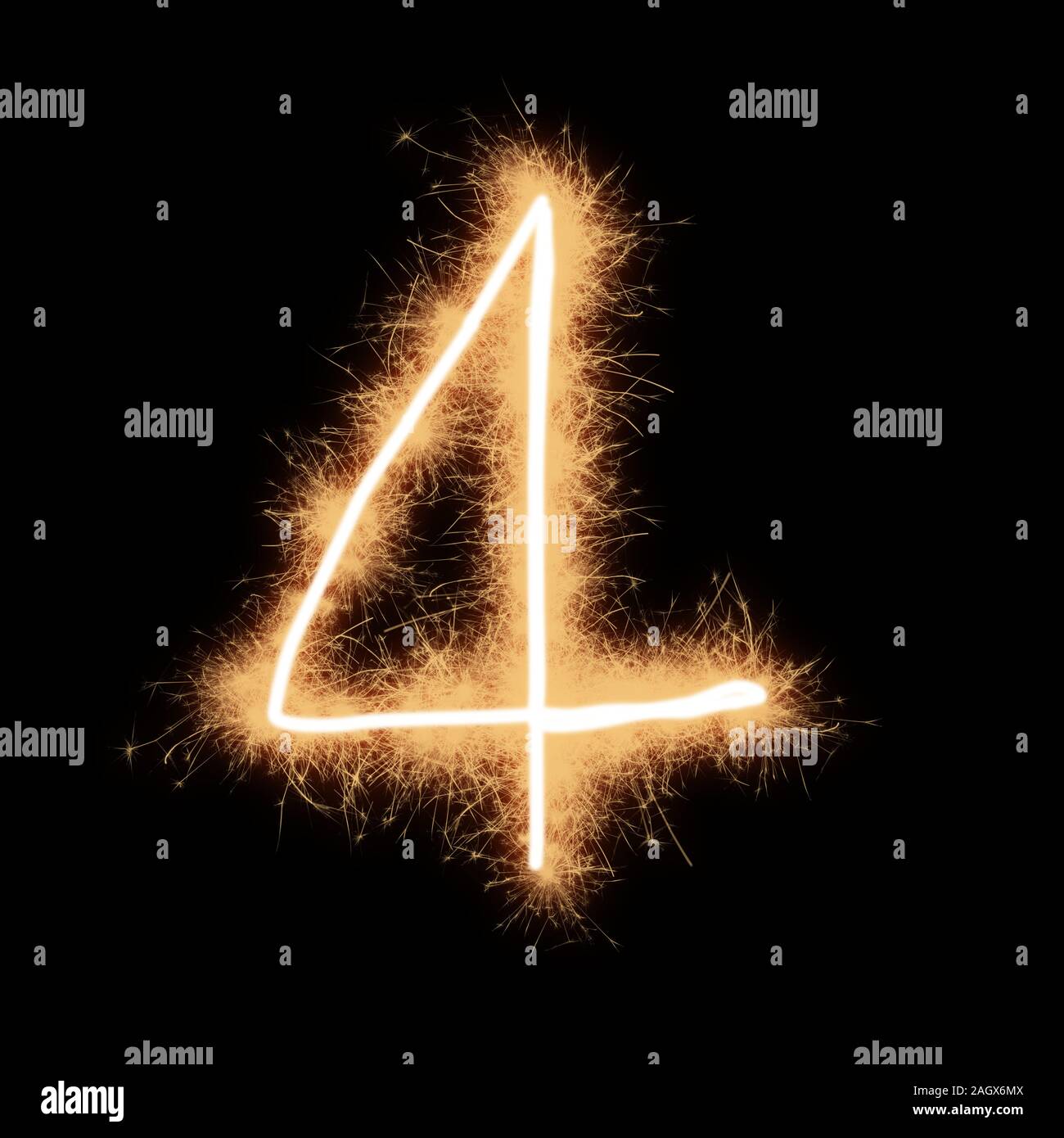Symbol of number four written by squib sparks on a black background ...
