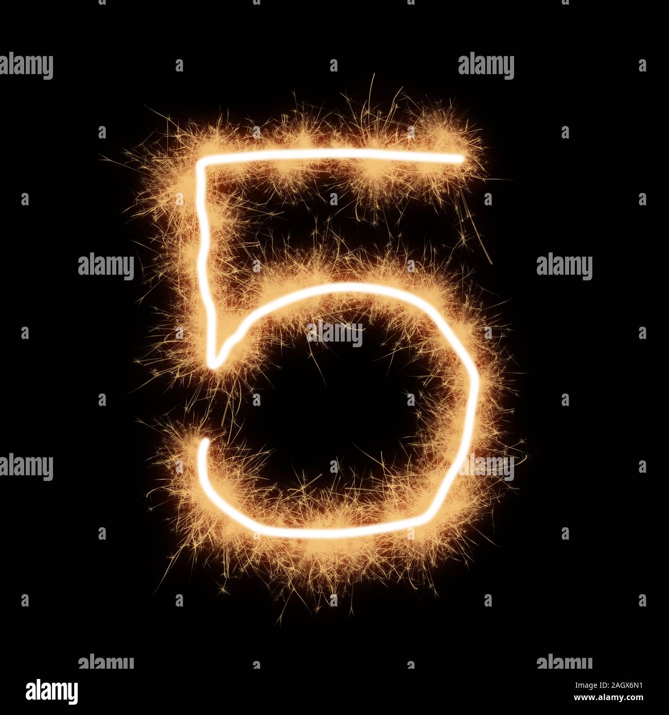 Symbol of number five written by squib sparks on a black background ...